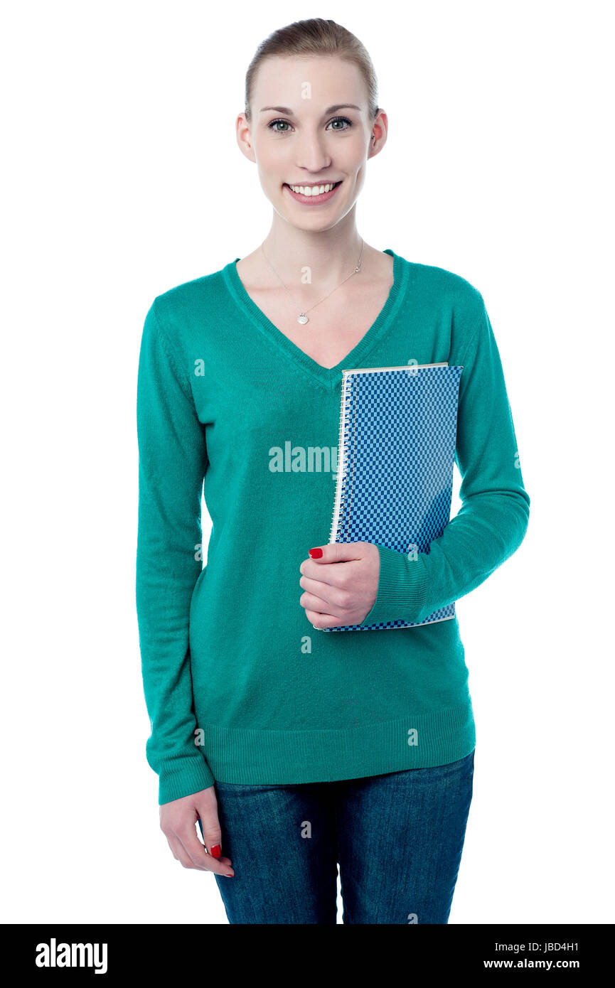 Beautiful girl posing as university student Stock Photo - Alamy