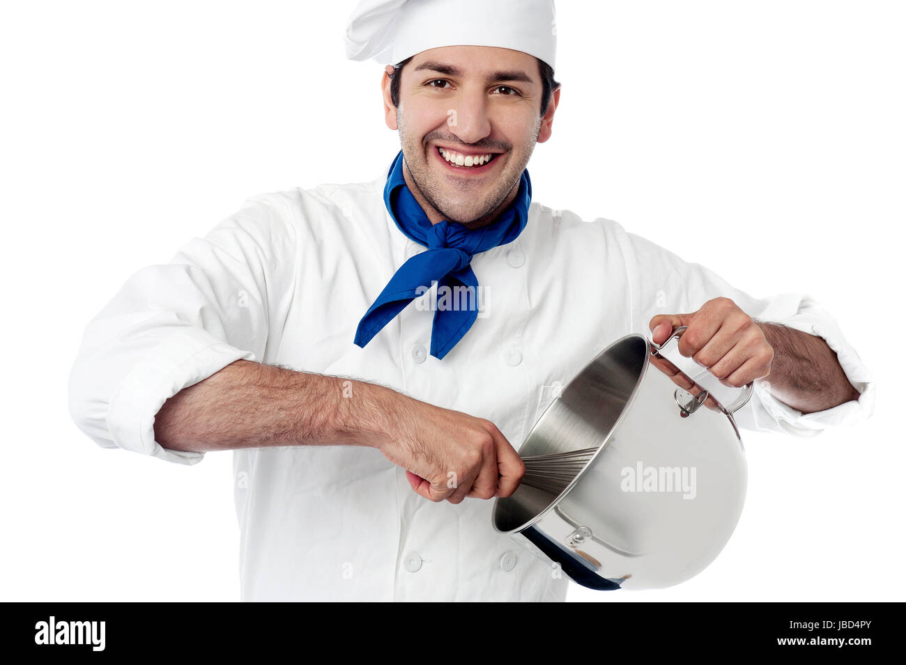 Young male chef mixing something in vessel Stock Photo - Alamy