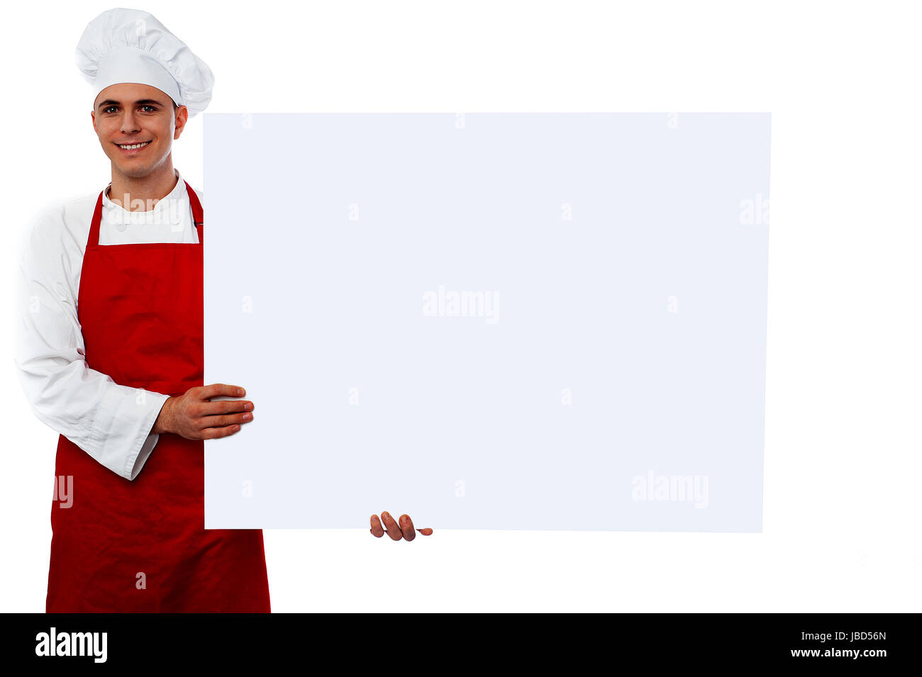 Handsome male chef holding blank ad board Stock Photo - Alamy