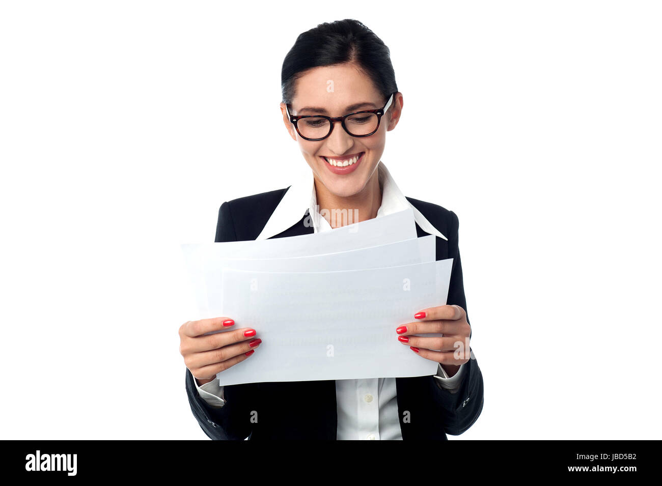 Happy corporate lady looking at the reports Stock Photo - Alamy