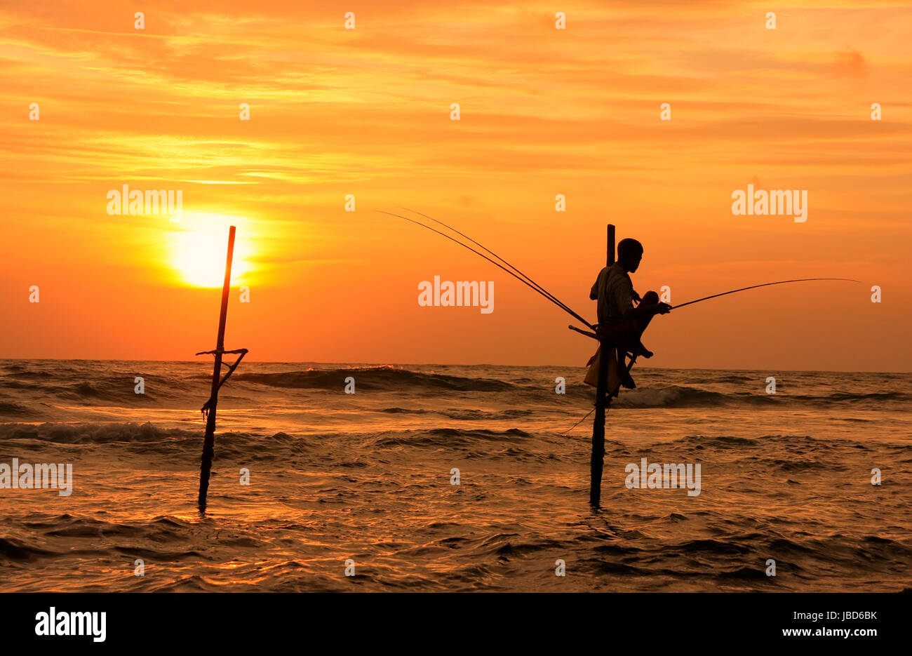 Silhouette of a stick fisherman at sunset, Unawatuna, Sri Lanka Stock ...