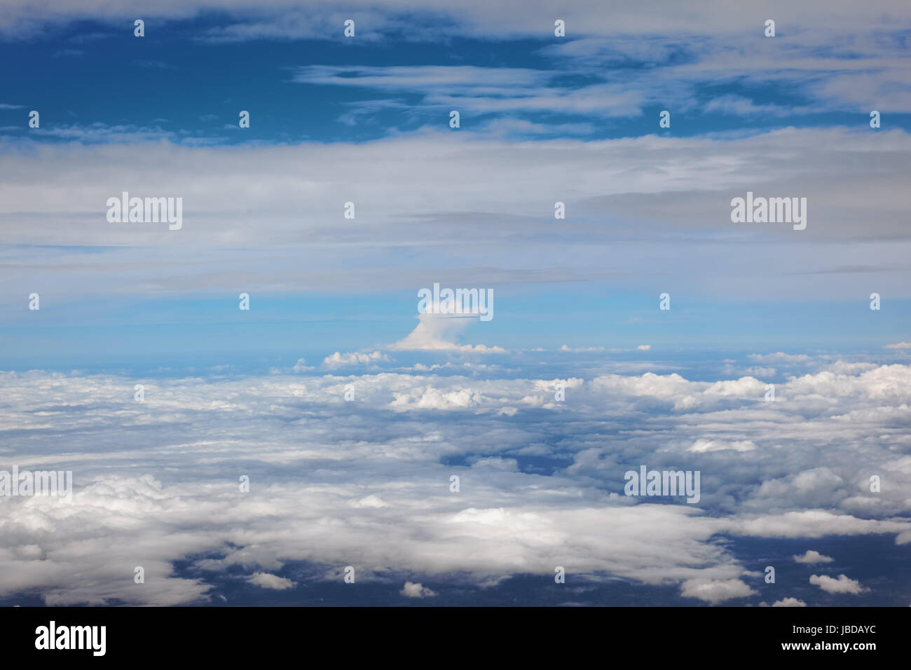 over the clouds, out of an aeroplane window Stock Photo - Alamy