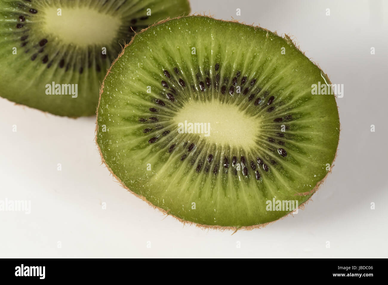 One half kiwi Stock Photo - Alamy
