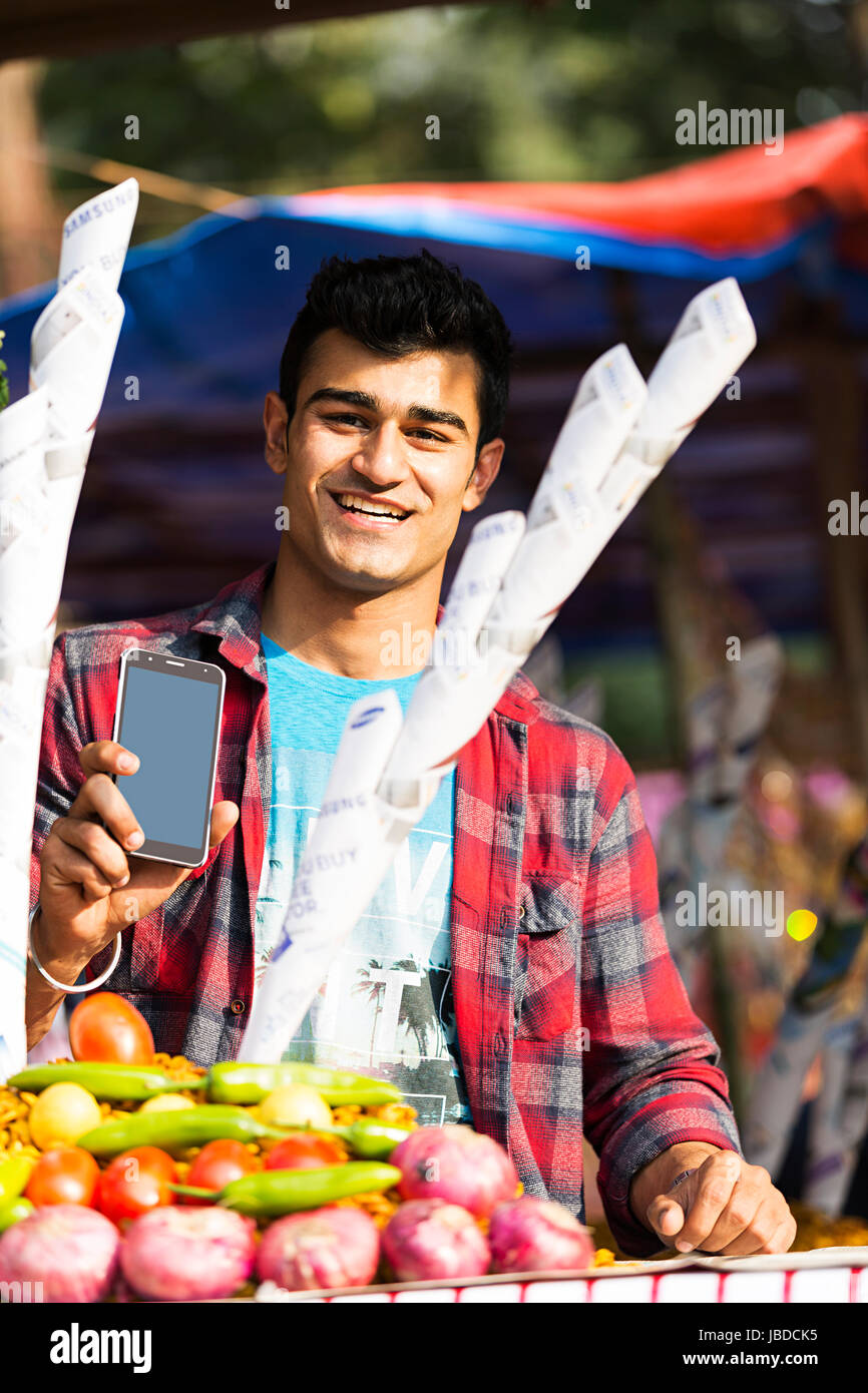 1 Teenage Boy Bhelpuri Stall And Showing Mobile Phone Fair Stock Photo ...