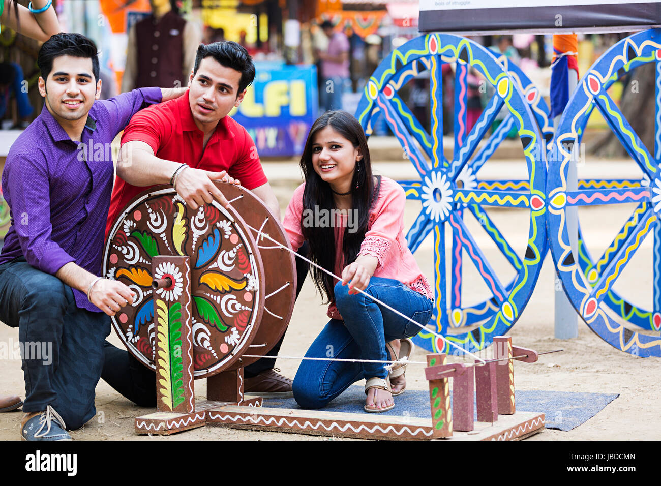 Smiling Teenager Friends Spinning Wheel Enjoy Market In Surajkund ...