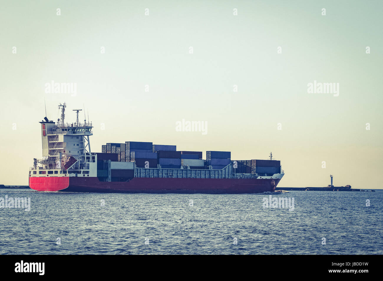 Red container ship sailing to the Baltic sea Stock Photo - Alamy