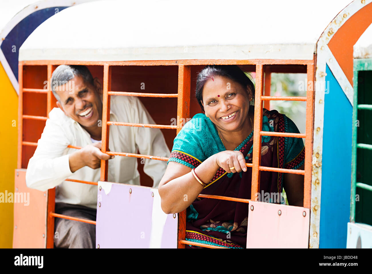 2 Senior Couple Ride Train Amusement Park Enjoy Smiling Stock Photo - Alamy