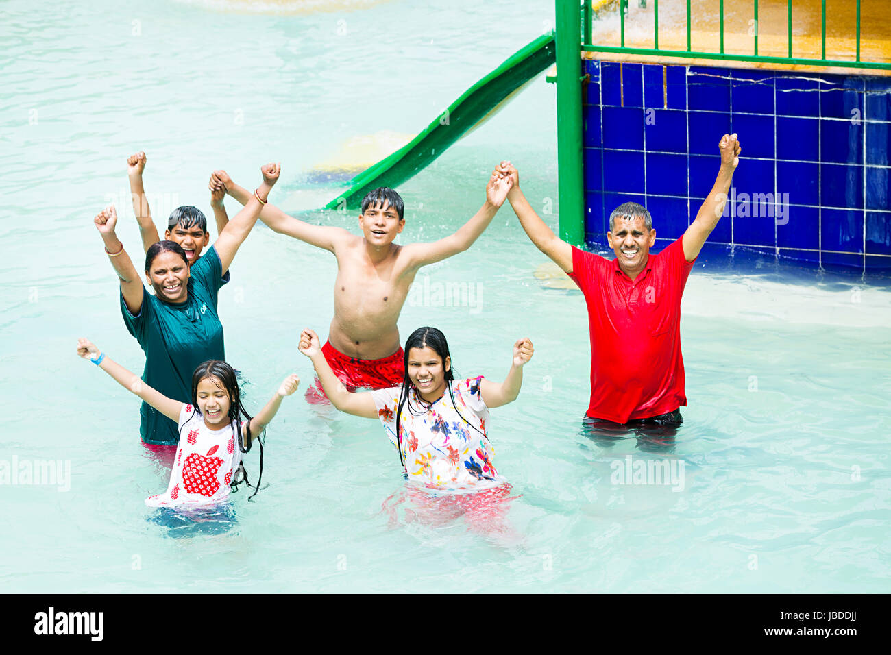 Family swimming pool indian hi-res stock photography and images - Alamy