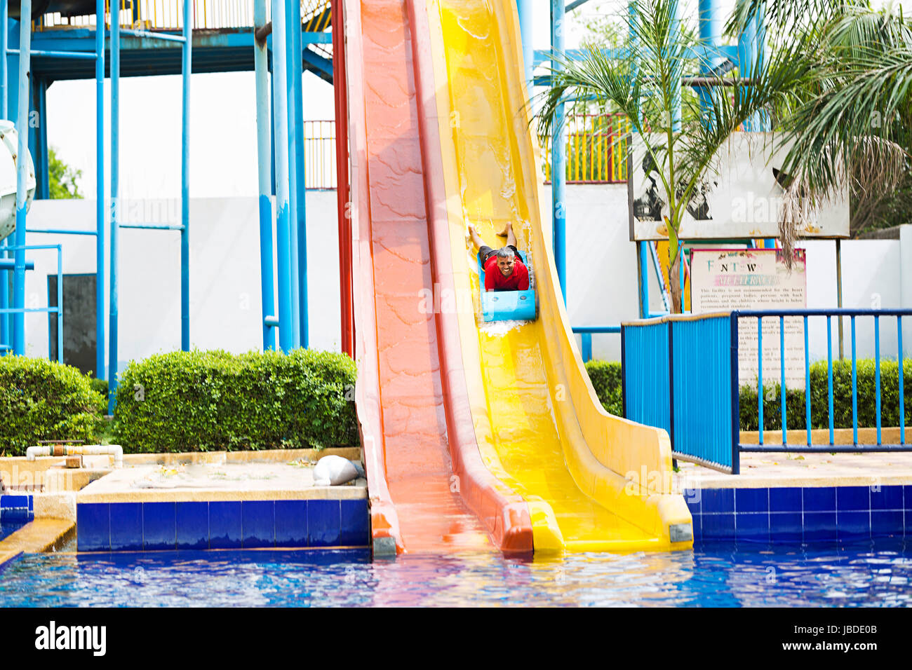 Old man happy pool hi-res stock photography and images - Alamy
