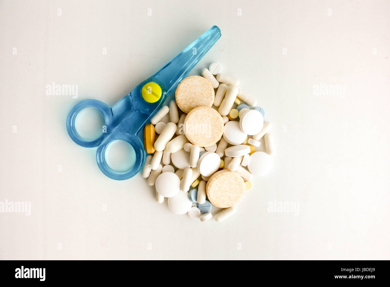 Medical pills and capsules with scissors. Photo for your design Stock ...