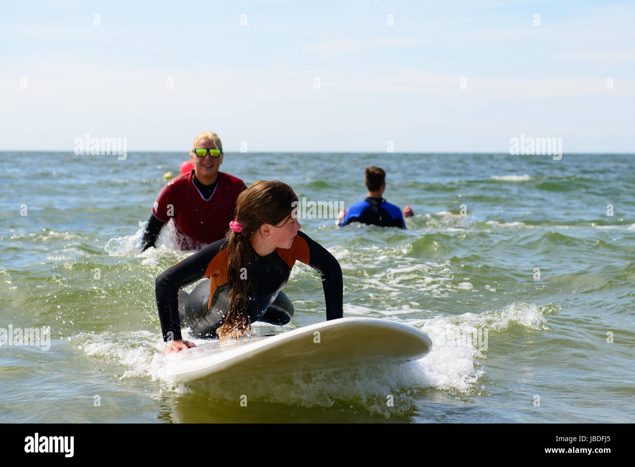 Child surf lessons hi-res stock photography and images - Alamy