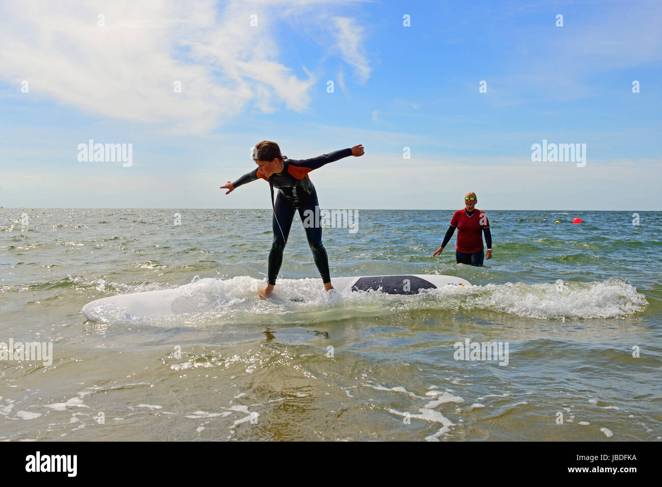 Child surf lessons hi-res stock photography and images - Alamy