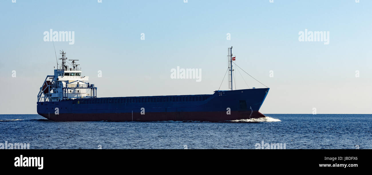 Blue cargo ship sailing from the Baltic sea Stock Photo - Alamy