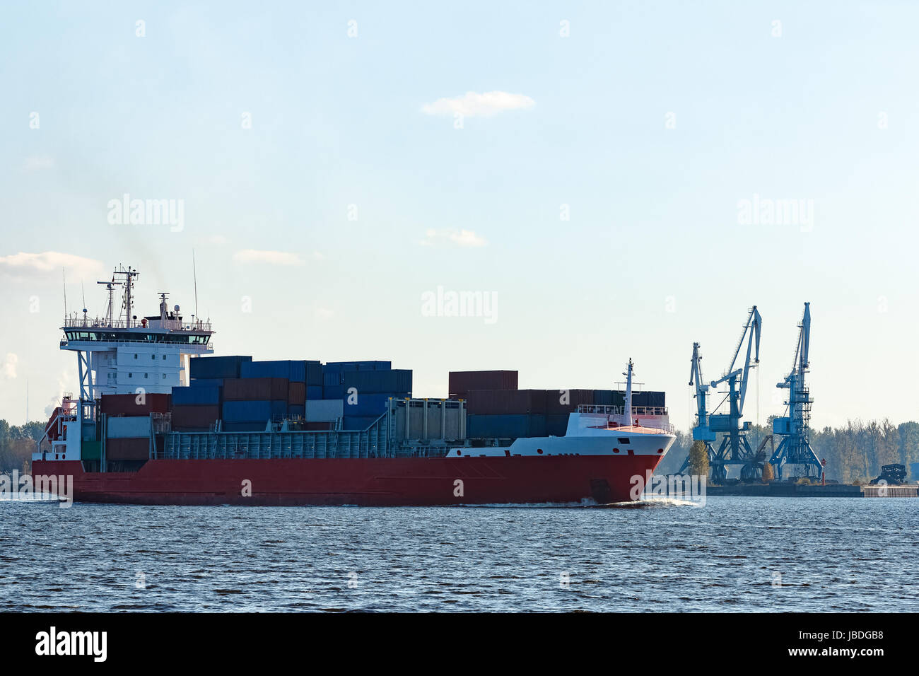 Red container ship sailing to the Baltic sea Stock Photo - Alamy