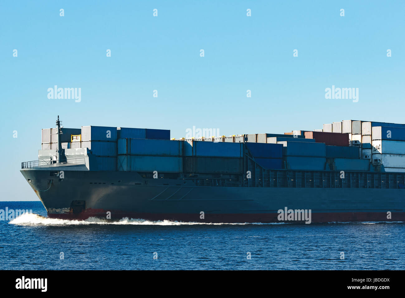 Large grey container ship moving from Baltic sea Stock Photo - Alamy