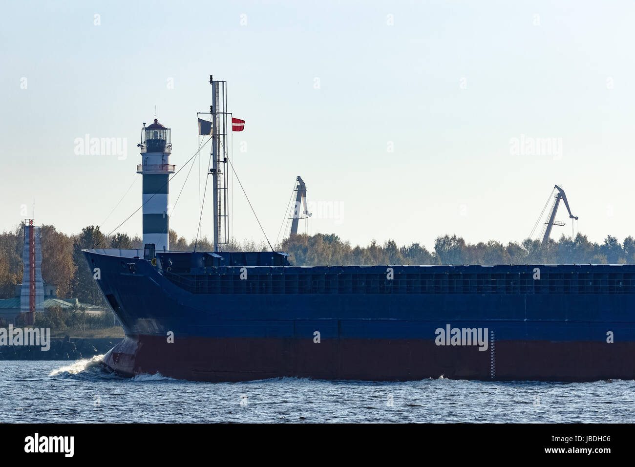 Blue cargo ship sailing from the Baltic sea Stock Photo - Alamy