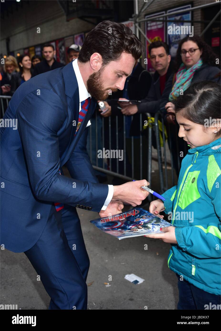 Aaron Taylor-Johnson poses for selfies and signs autographs outside ...