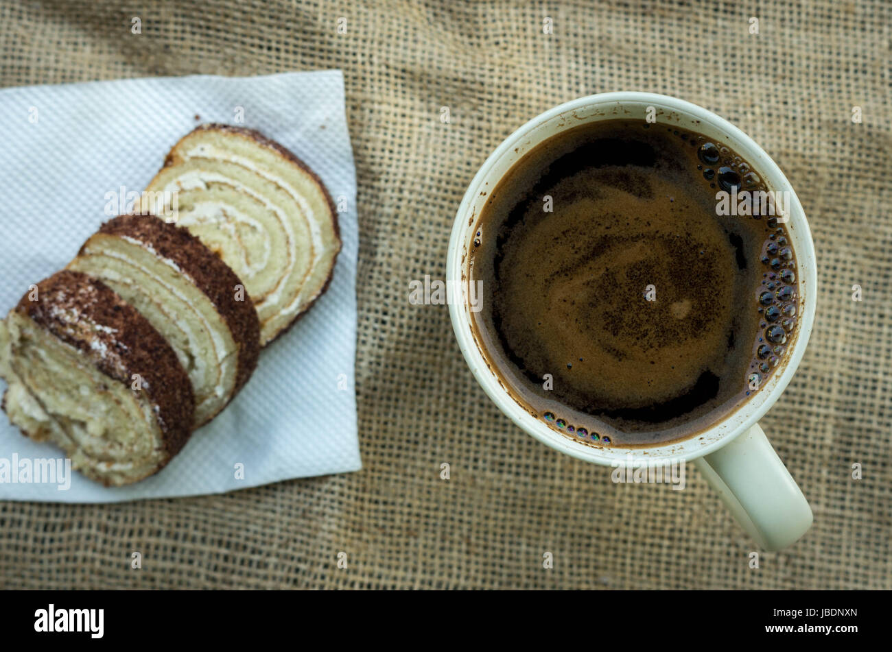 Morning black coffee with coffee cakes. Top view Stock Photo - Alamy