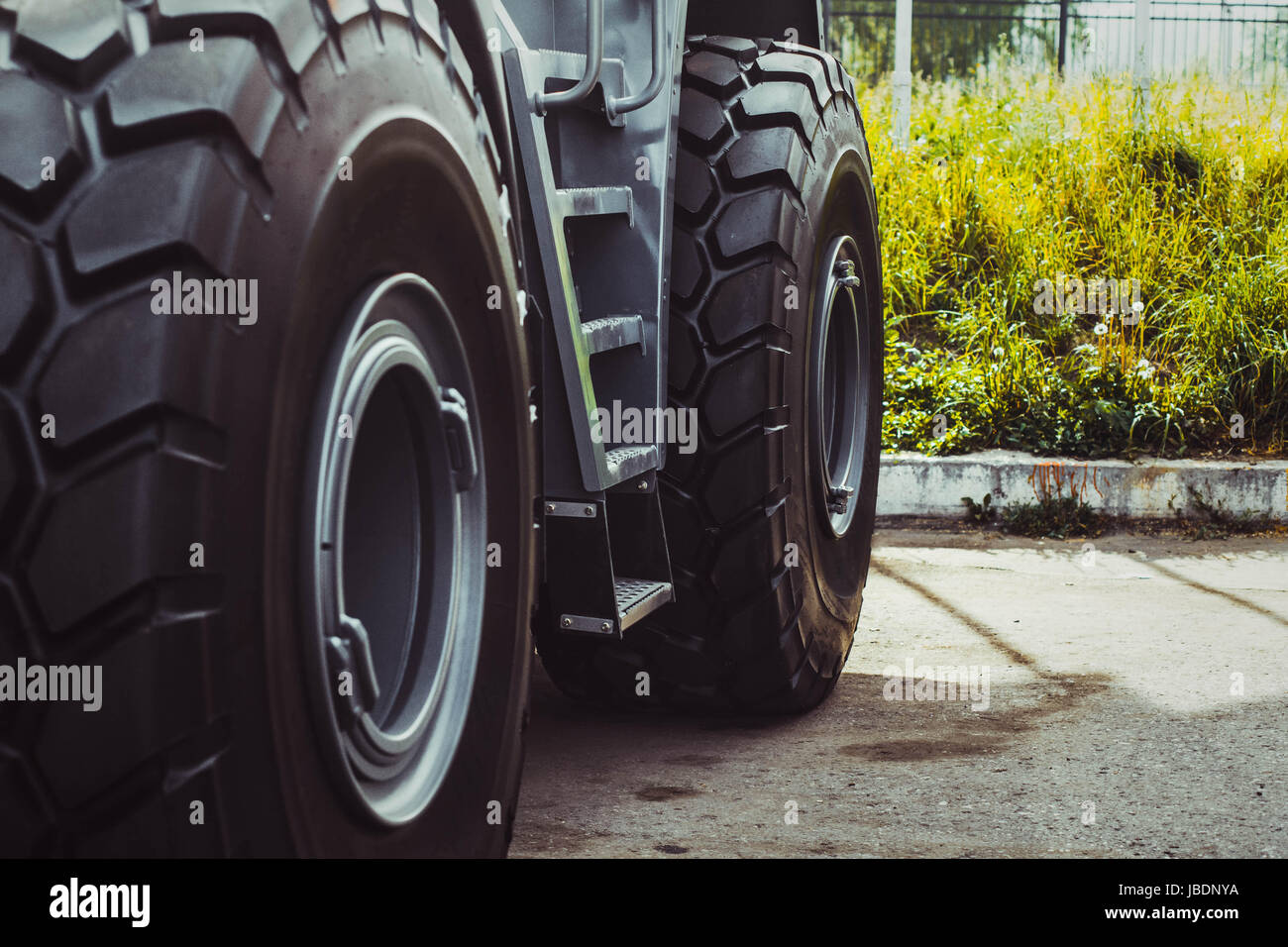 Cargo tires are new at the mining exhibition Stock Photo - Alamy