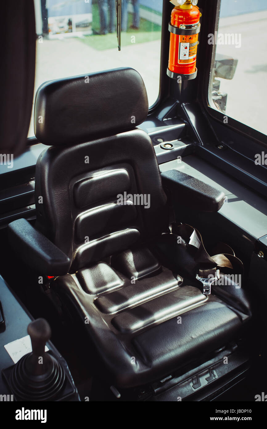 Detailing of the new driver's cab excavator Stock Photo - Alamy