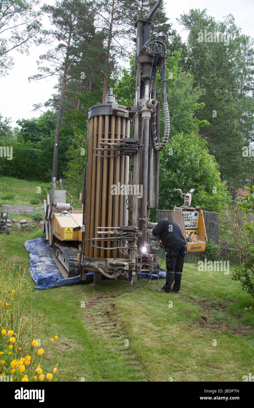 GEOTHERMAL HEATH 2017 Mountain heat drilling in villa garden Stock ...