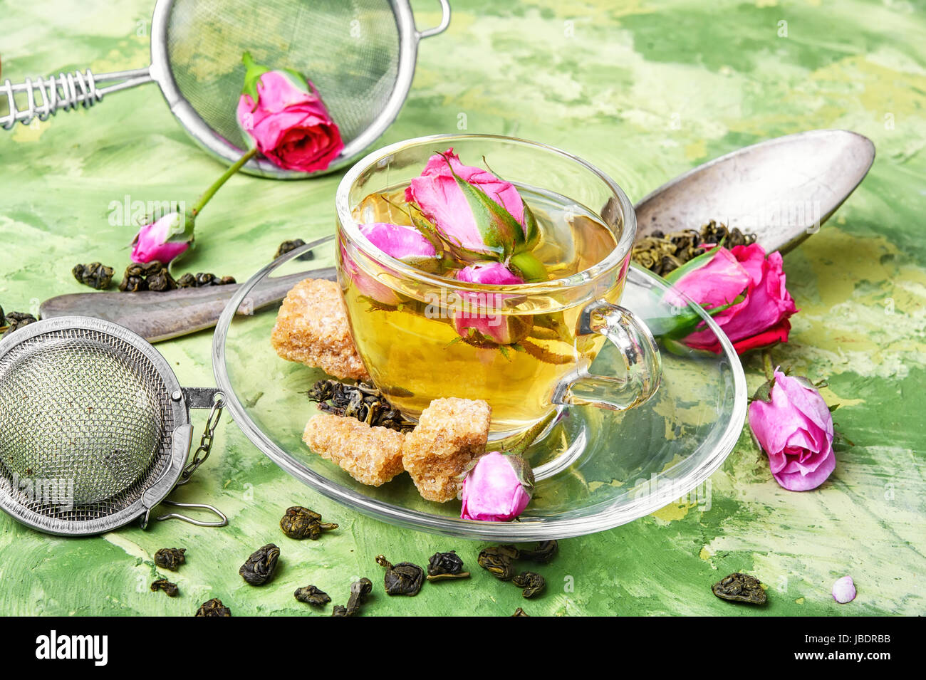 rosebuds and a cup of herbal tea Stock Photo - Alamy