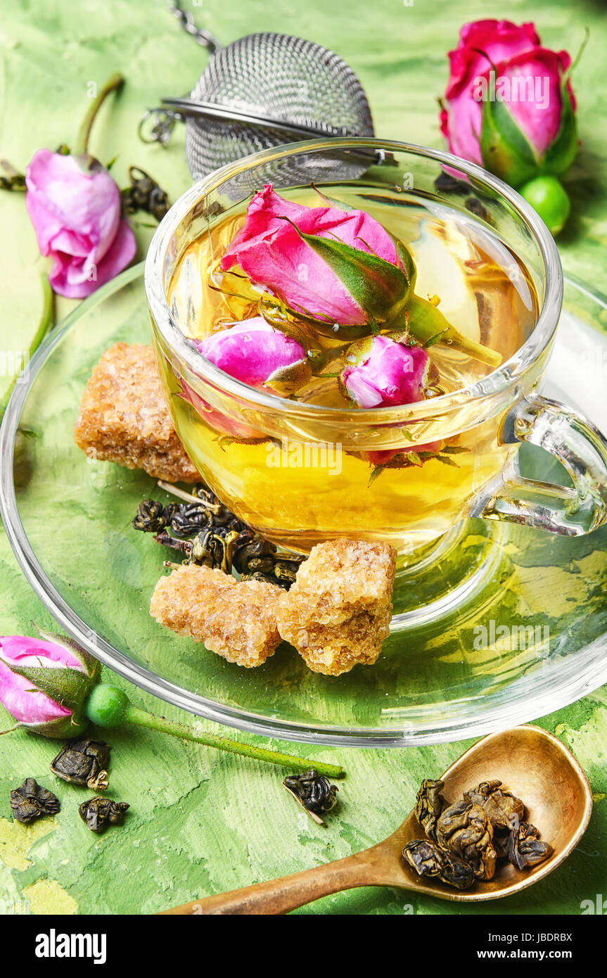 rosebuds and a cup of herbal tea Stock Photo - Alamy
