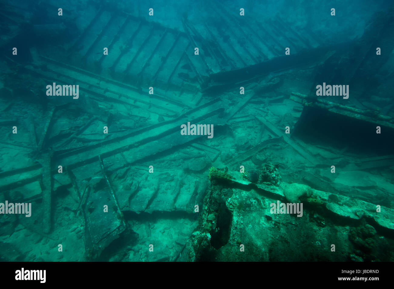 Broken part of shipwreck on bottom of blue sea water Stock Photo - Alamy