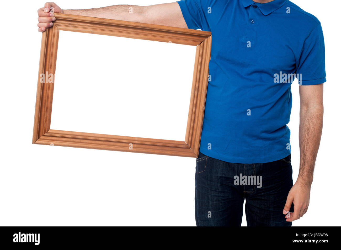 Cropped image of a man holding photo frame Stock Photo - Alamy