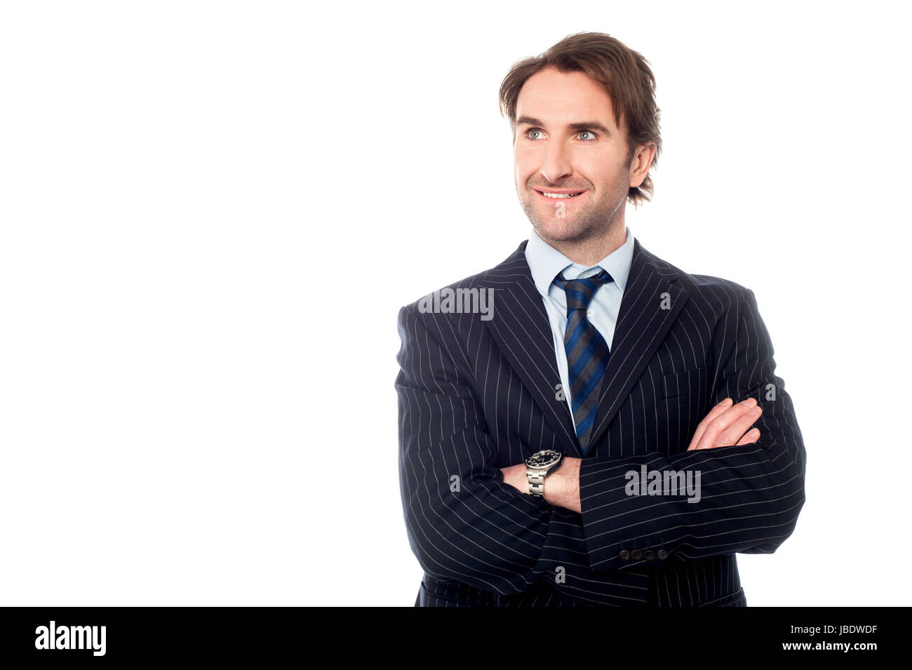 Smart male business professional, arms crossed Stock Photo - Alamy