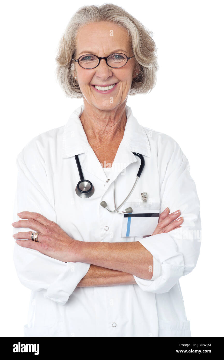 Female doctor is standing confidently with her arms crossed hi-res stock photography and images ...