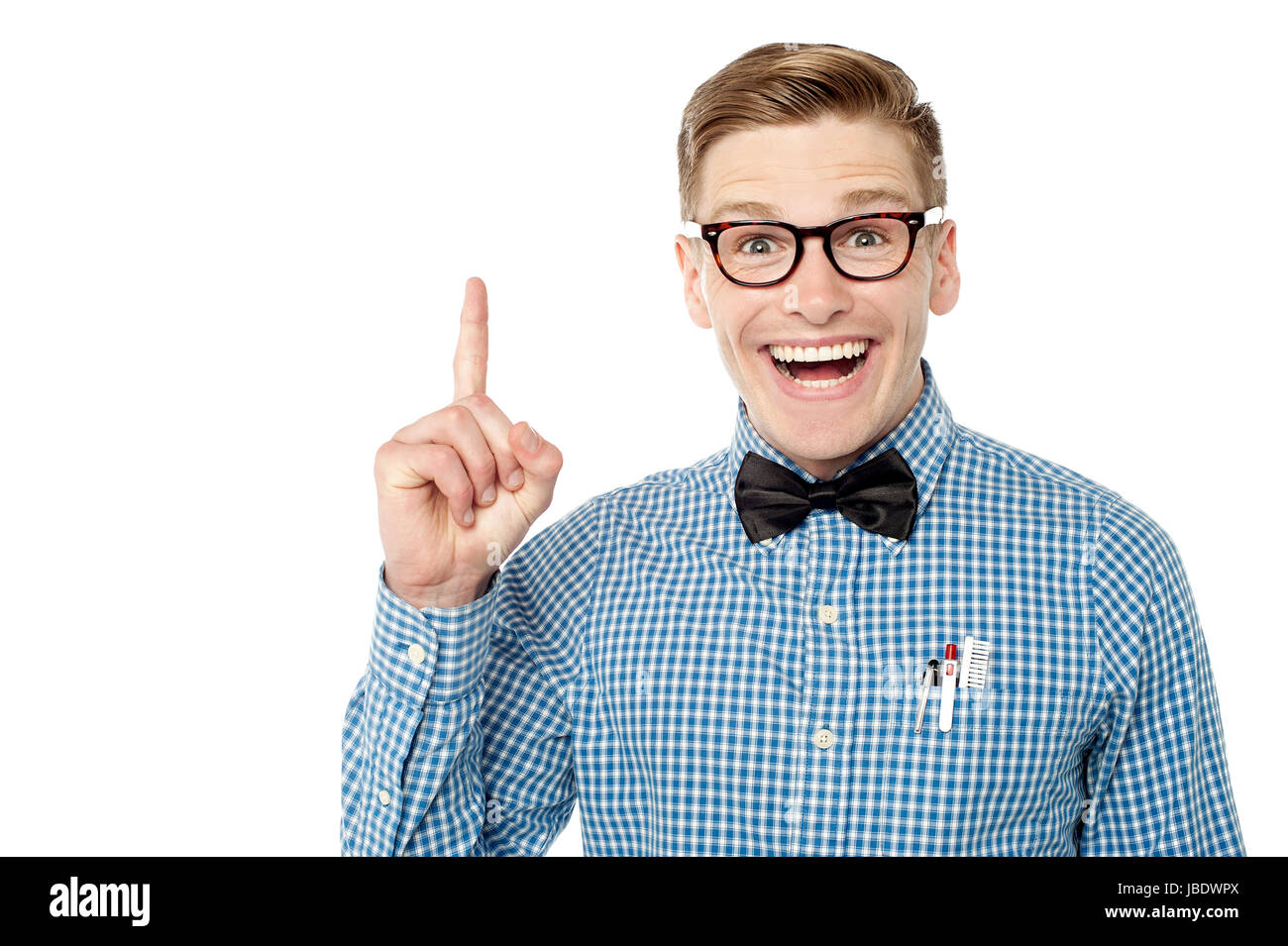 Excited young guy raising his finger Stock Photo - Alamy