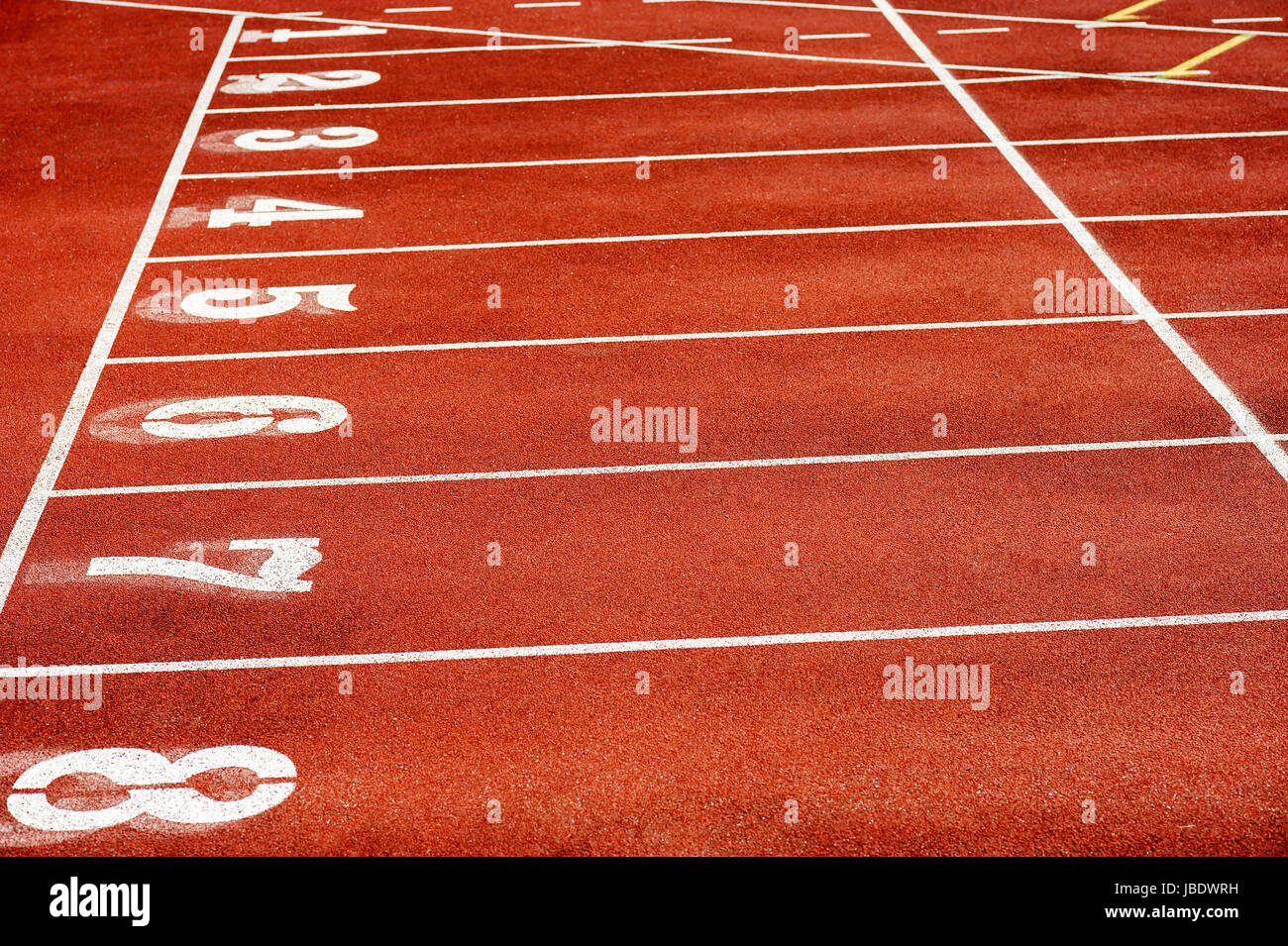 Numbers on retro sport running track Stock Photo - Alamy