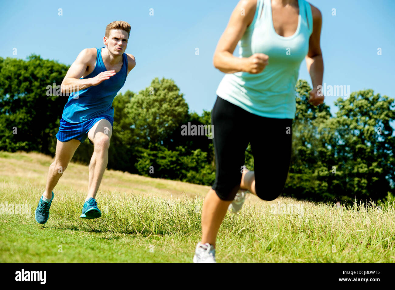 Two runners sprinting outdoors hi-res stock photography and images - Alamy
