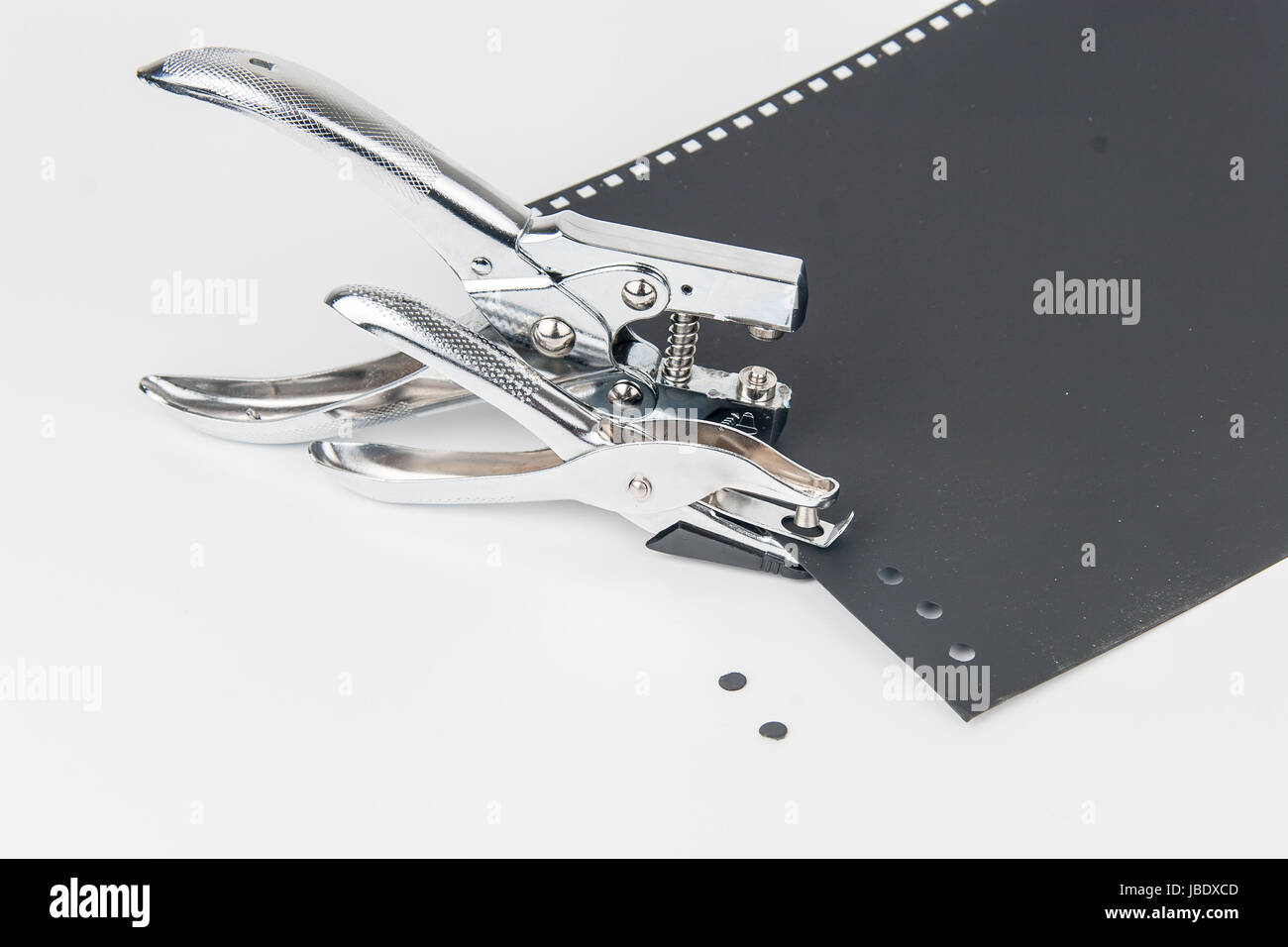 Office Puncher Unit isolated on white background Stock Photo - Alamy