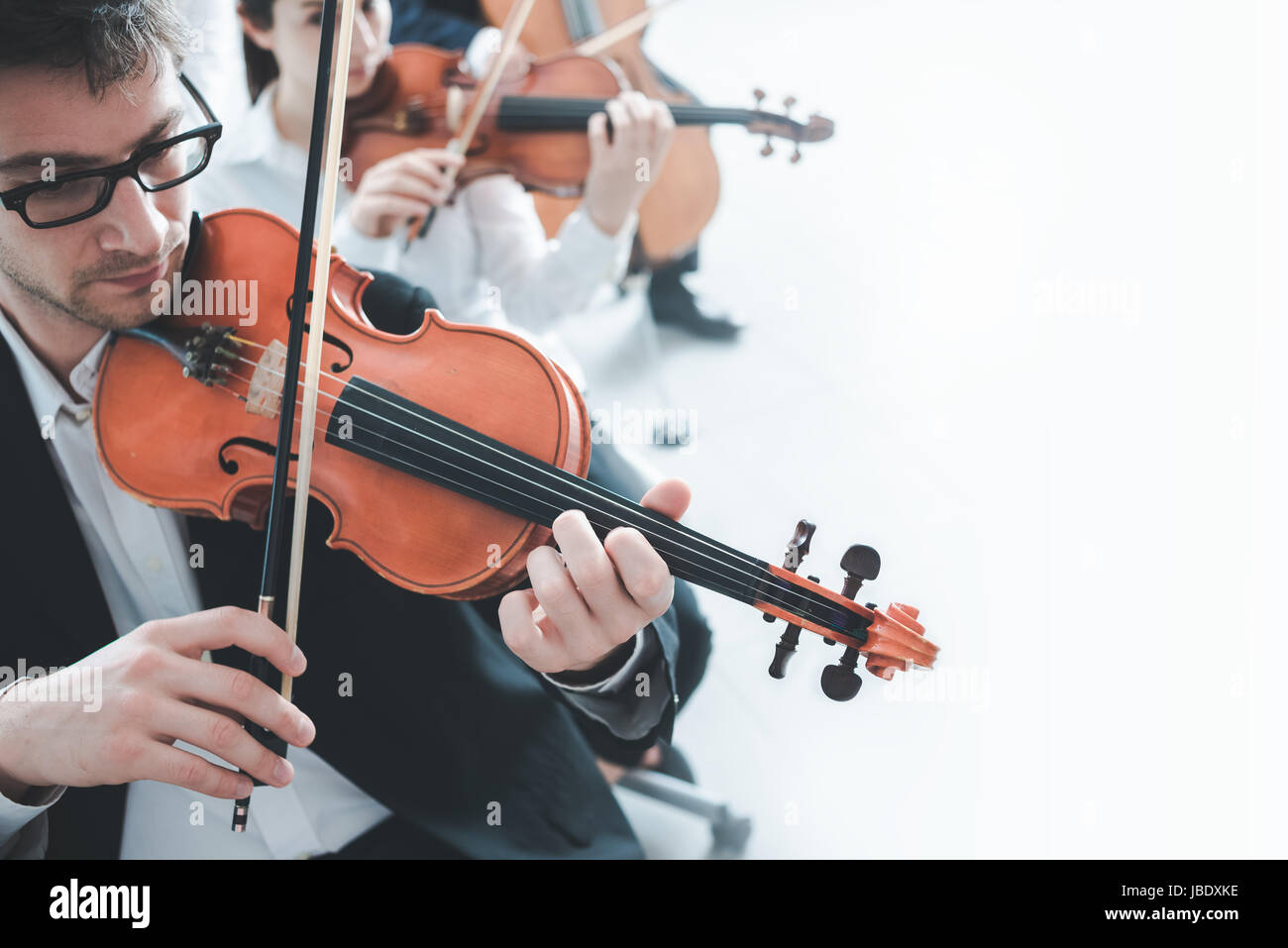 Professional violinists performing male hi-res stock photography and ...