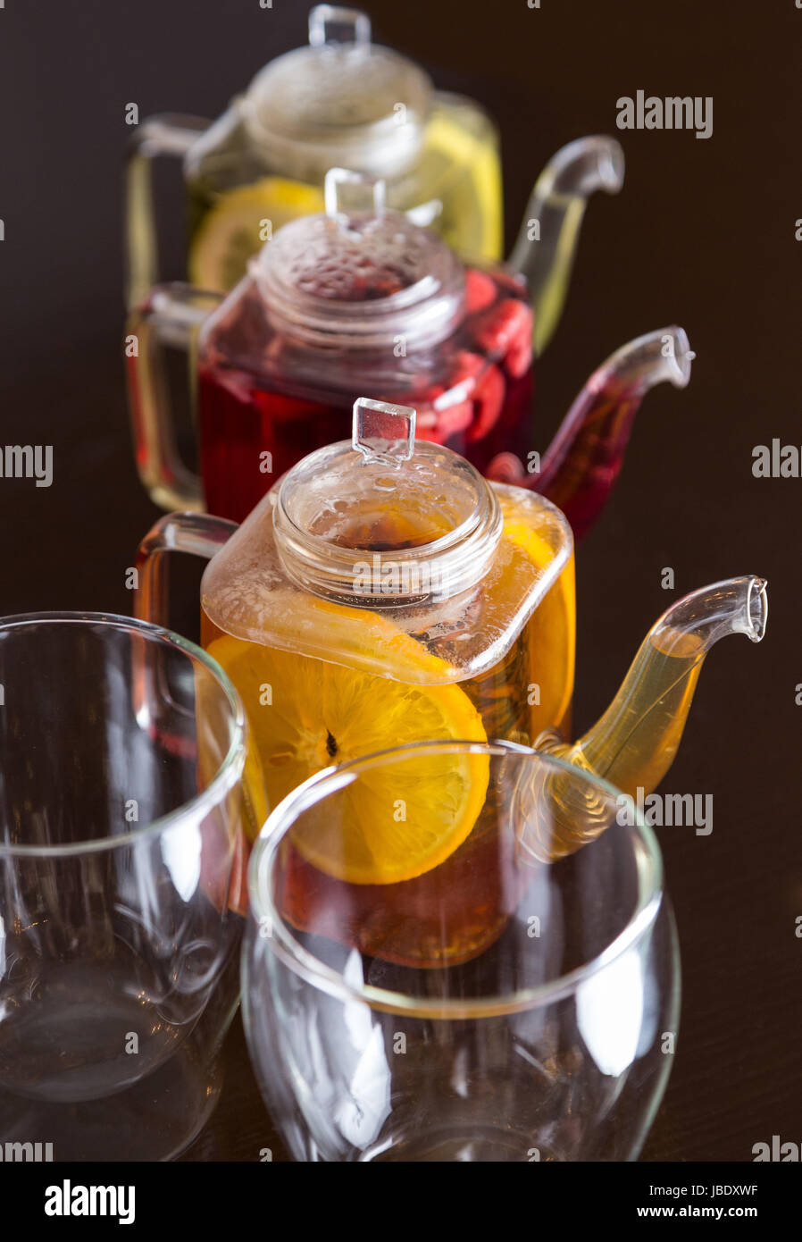 three square teapots with different colors fruit tastes of tea Stock ...