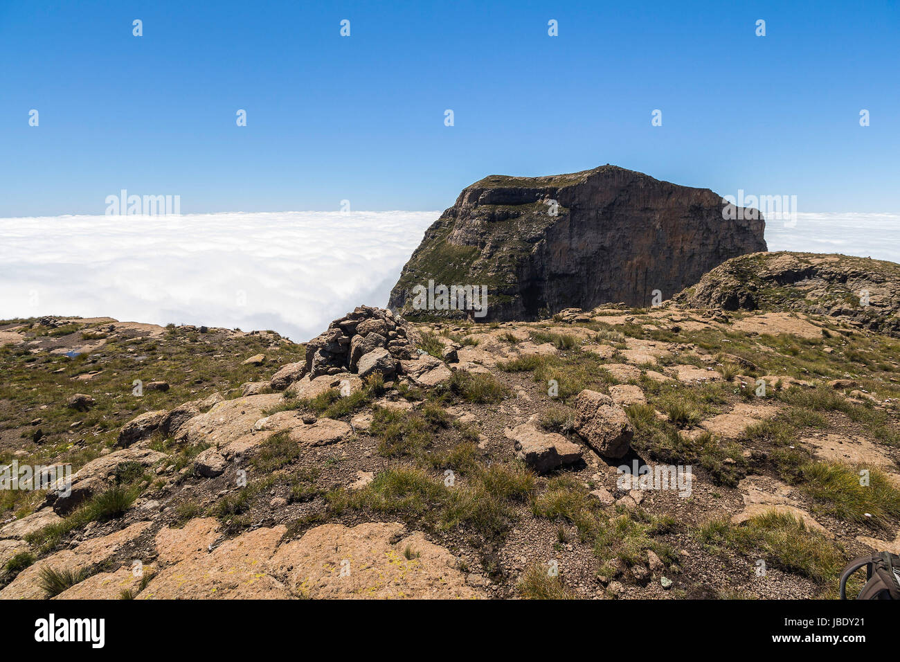 Clouds reaching the plateau of Drakensberge at the Sentinel Hike Stock ...