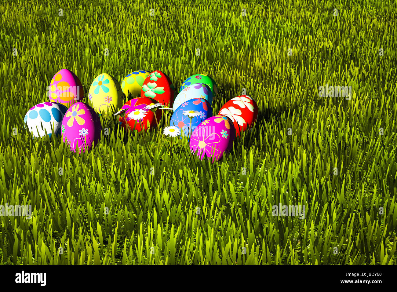 Colorful Easter eggs in green grass Stock Photo - Alamy