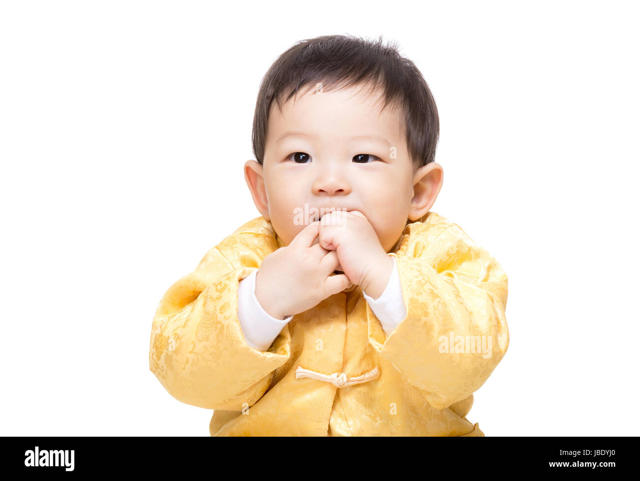 Chinese baby boy bite finger Stock Photo - Alamy