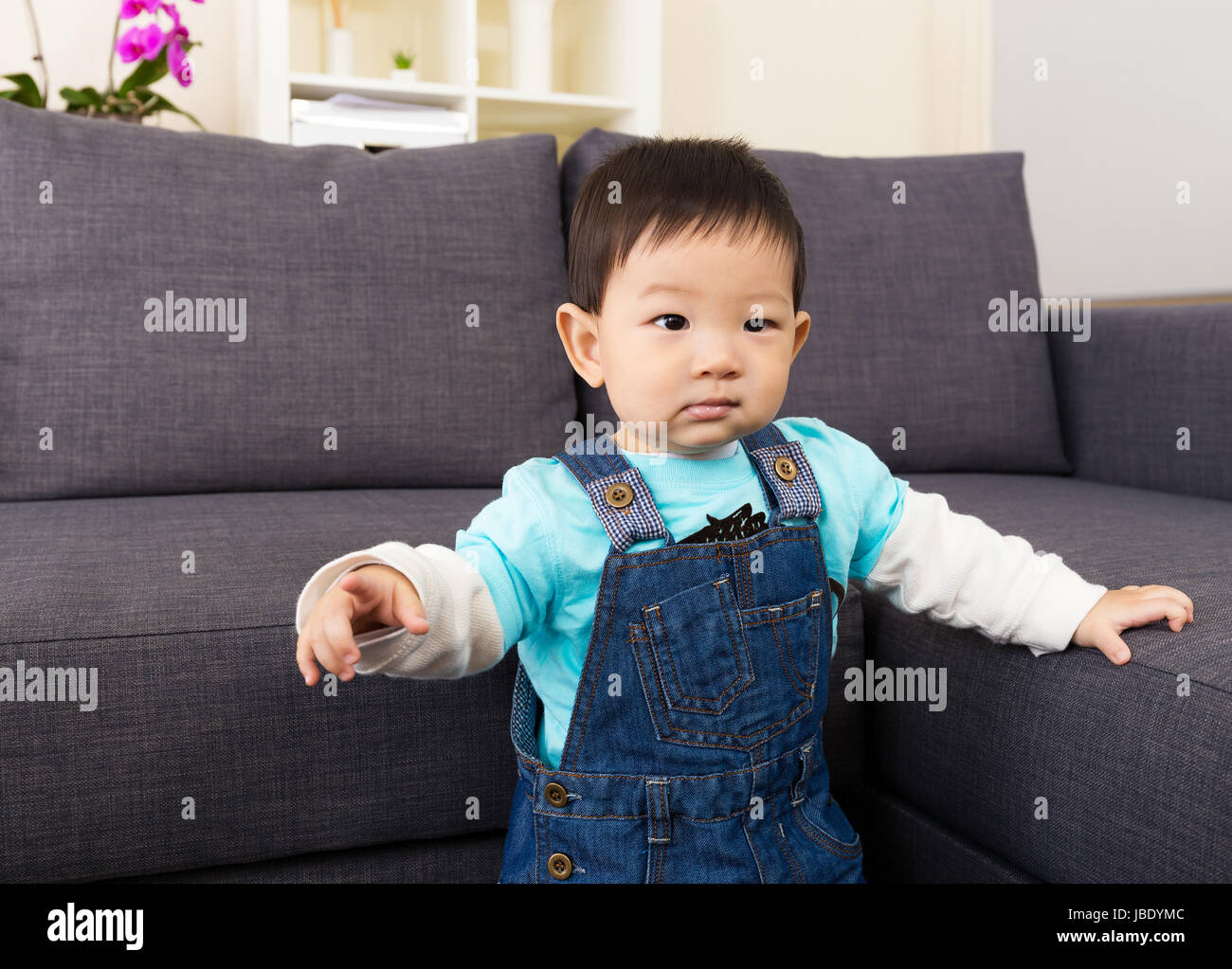 Boy child pointing forward asian hi-res stock photography and images ...