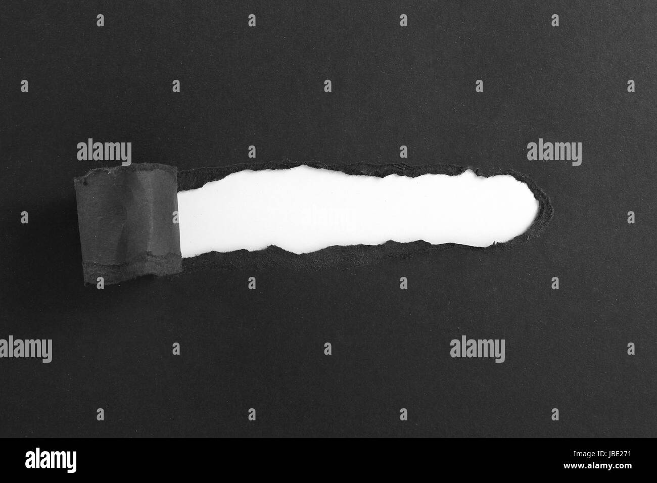 Torn paper hole background Black and White Stock Photos & Images - Alamy