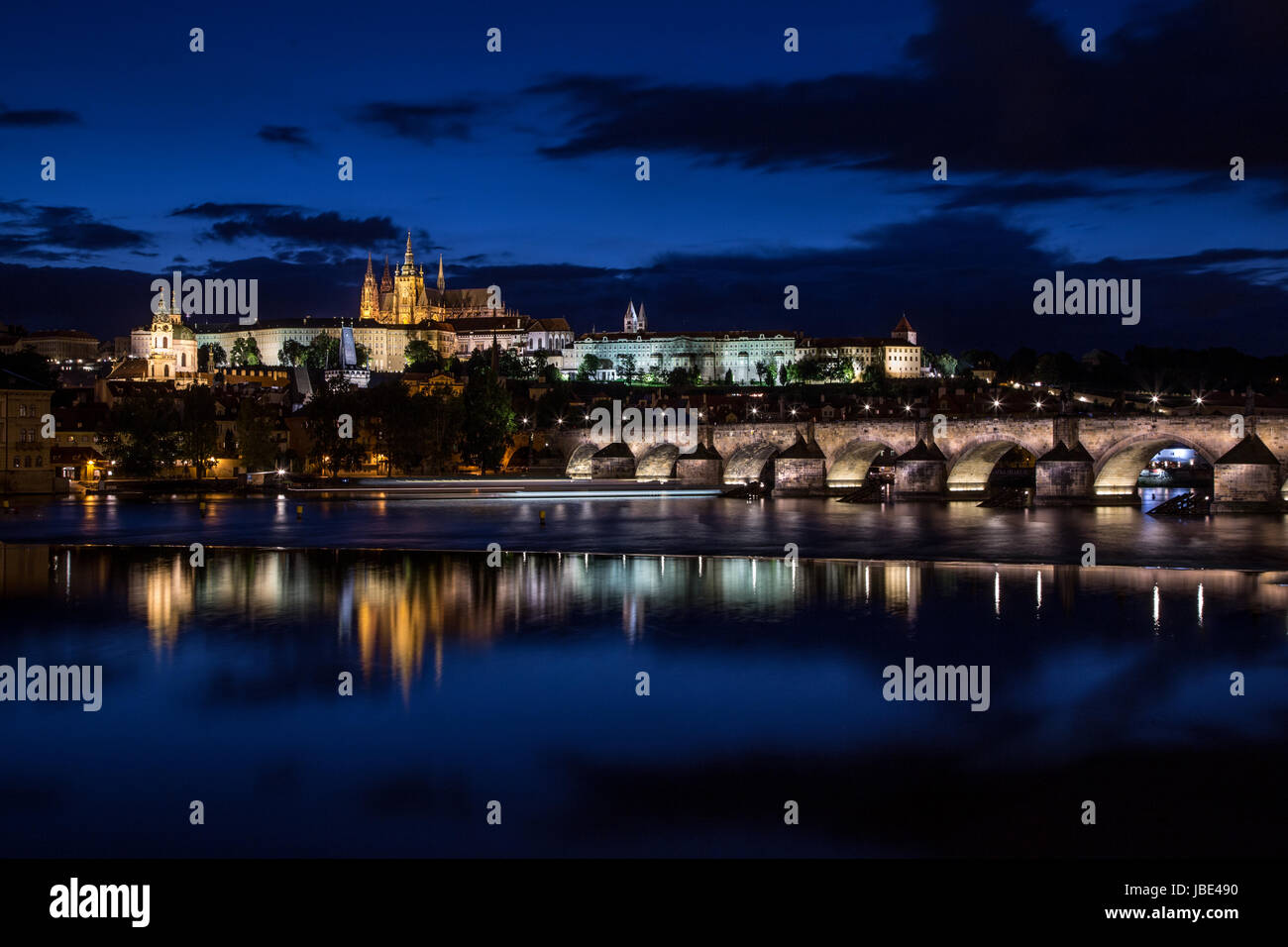 Prague castle at night with bridge Stock Photo - Alamy