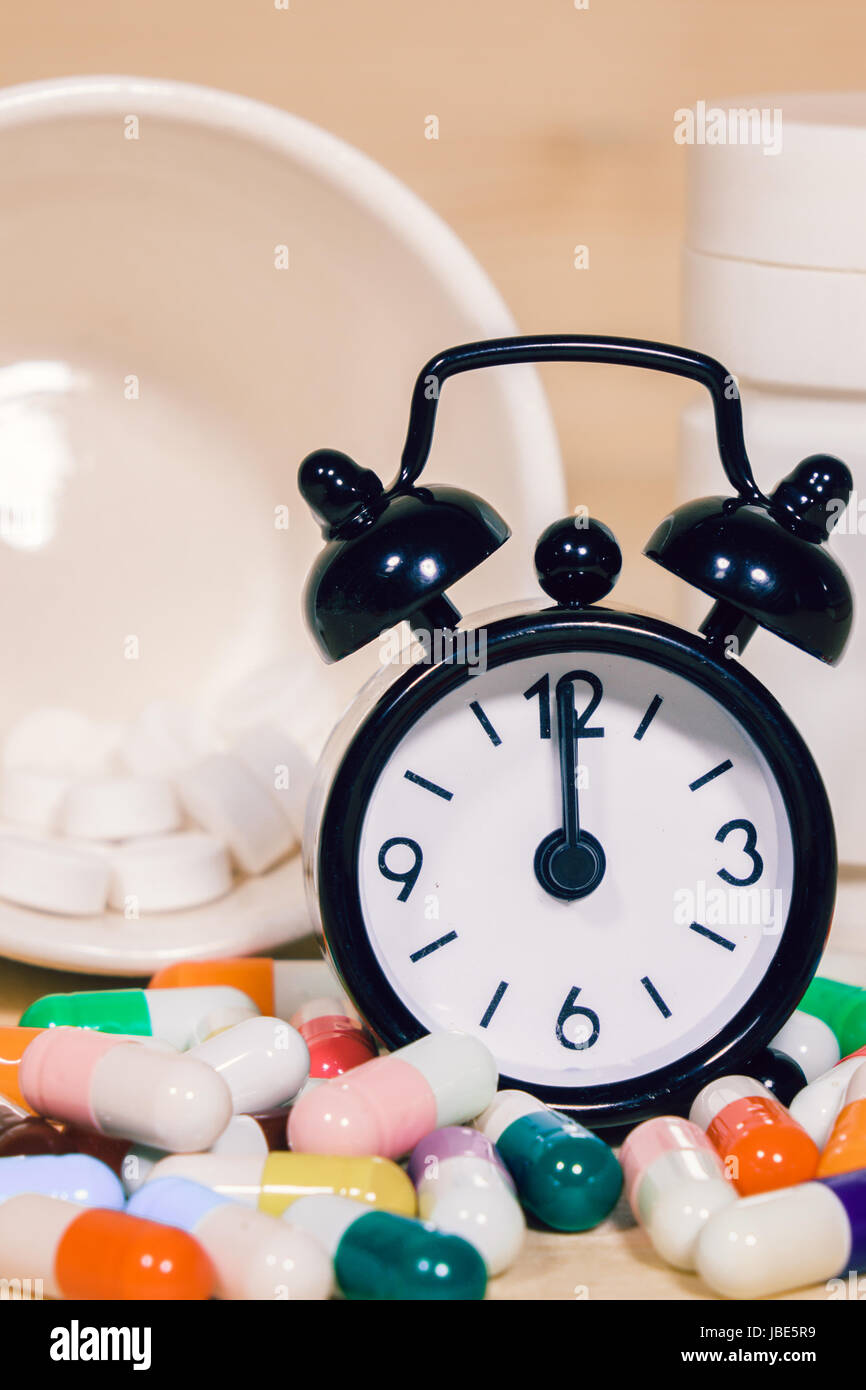 Take medicine on time doctor hi-res stock photography and images - Alamy