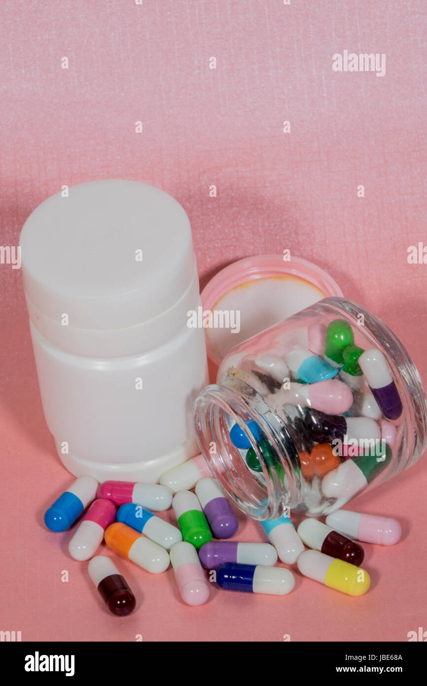 pharmacy background on a pink table. Pills. Medicine and healthy. Close ...