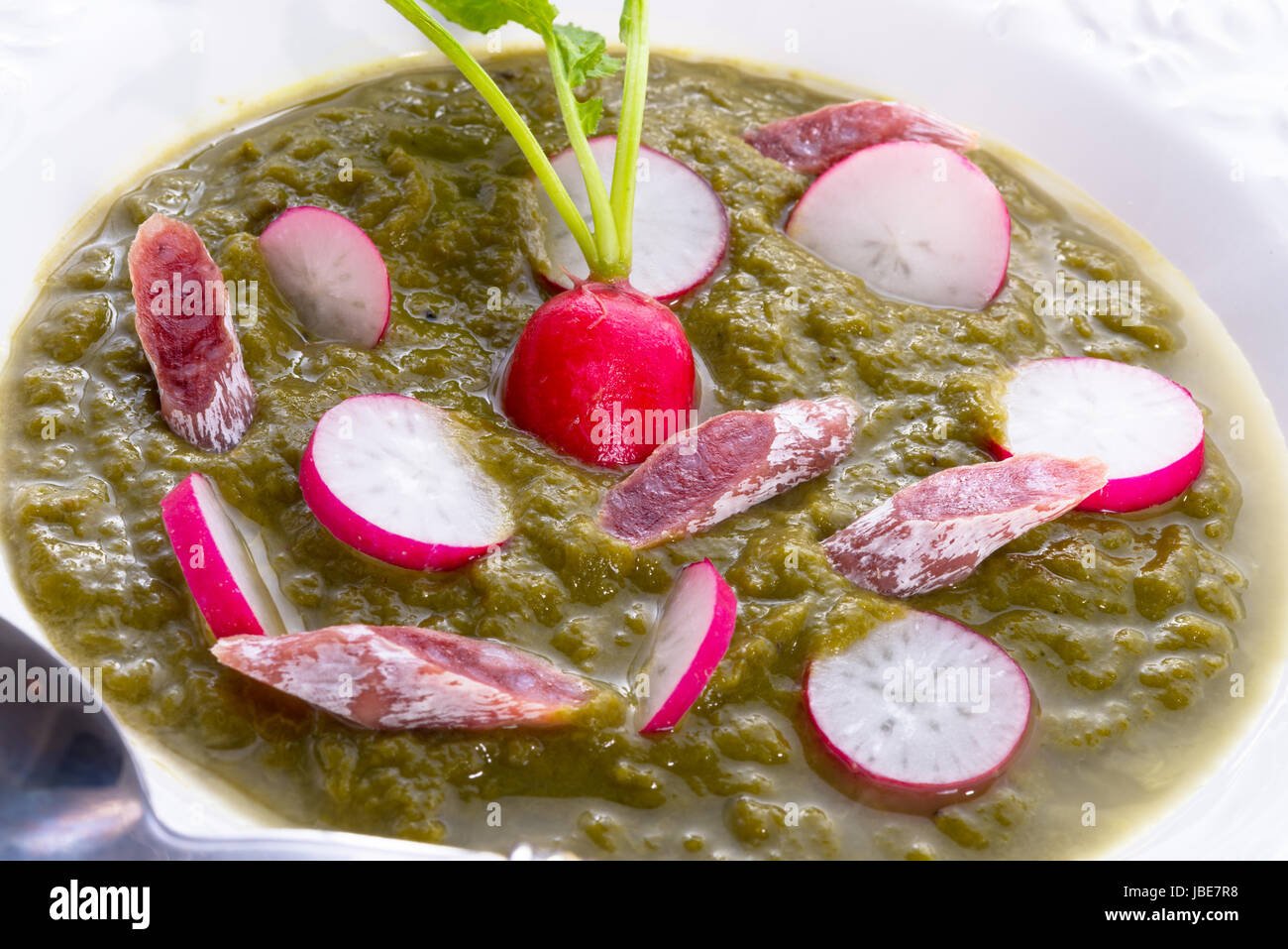 Green radish soup Stock Photo - Alamy