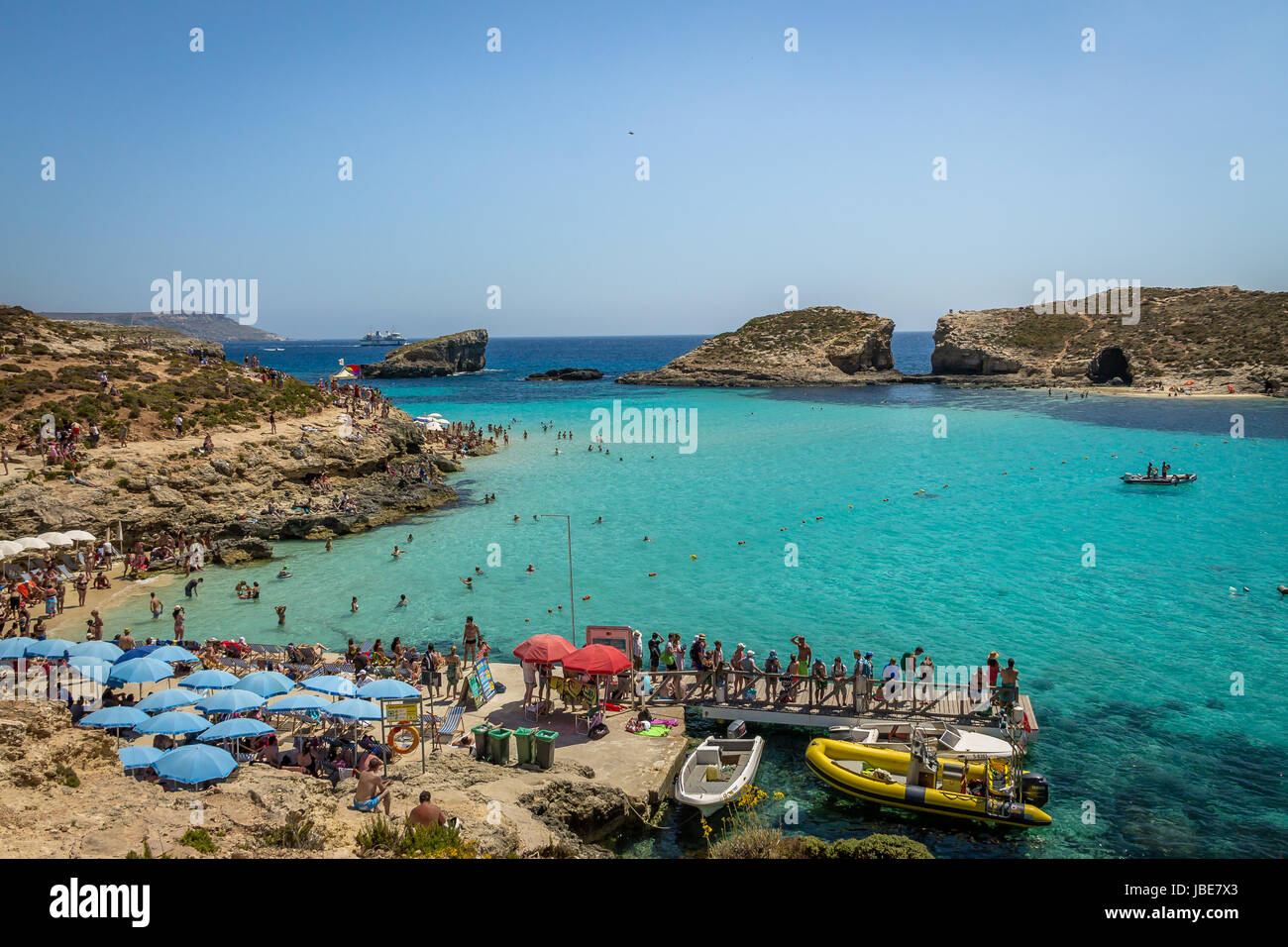 People at the Blue Lagoon in Comino Island - Gozo, Malta Stock Photo ...