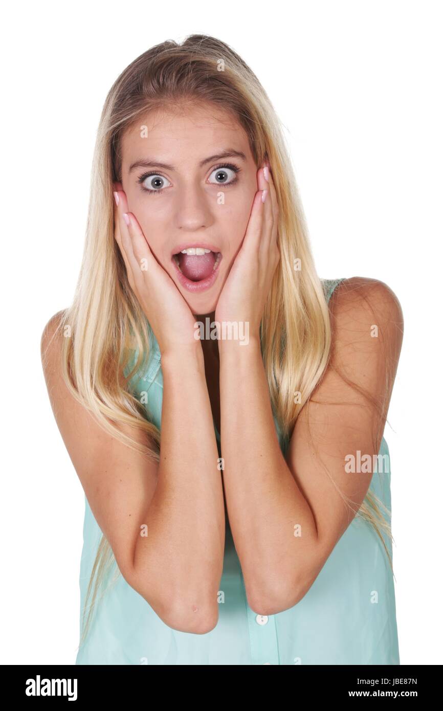 Pretty blond woman with mouth open and wide open eyes in shock Stock ...