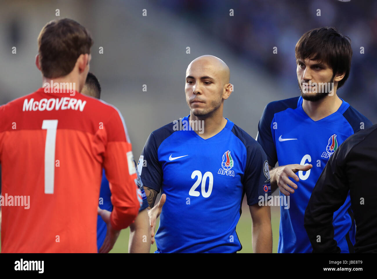 Azerbaijan's Richard Almeida shakes hands with Northern Ireland ...