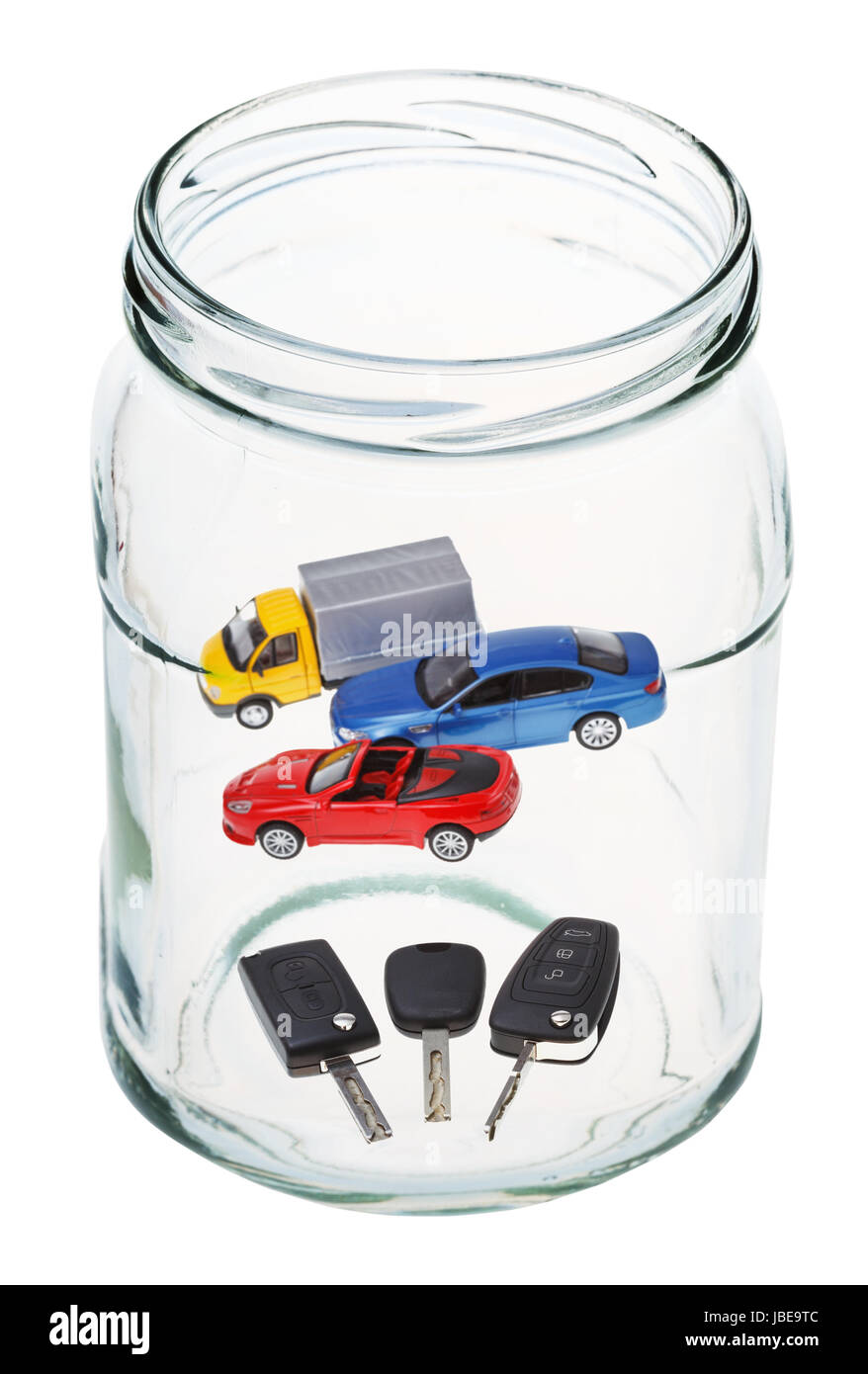 three new cars and keys in open glass jar Stock Photo - Alamy
